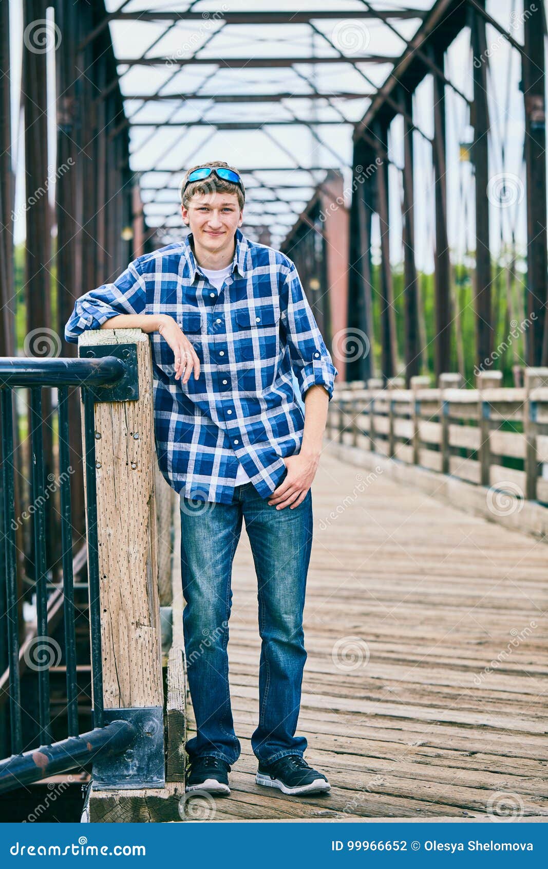 Portrait of Happy Young Man Standing on Bridge Stock Photo - Image of ... Portrait of Happy Young Man Standing on Bridge Stock Photo - Image of ...