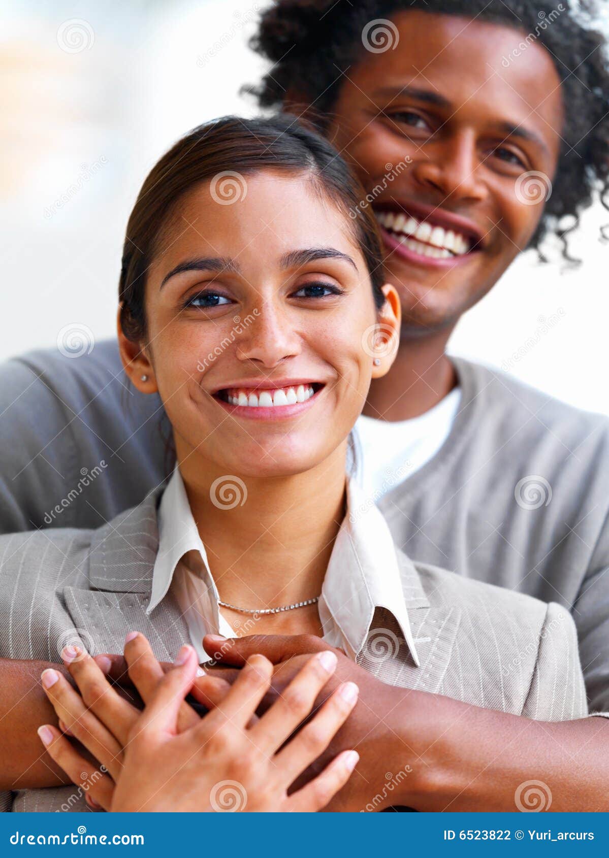 Portrait of a Happy Young Couple Hugging Stock Photo - Image of hands ...