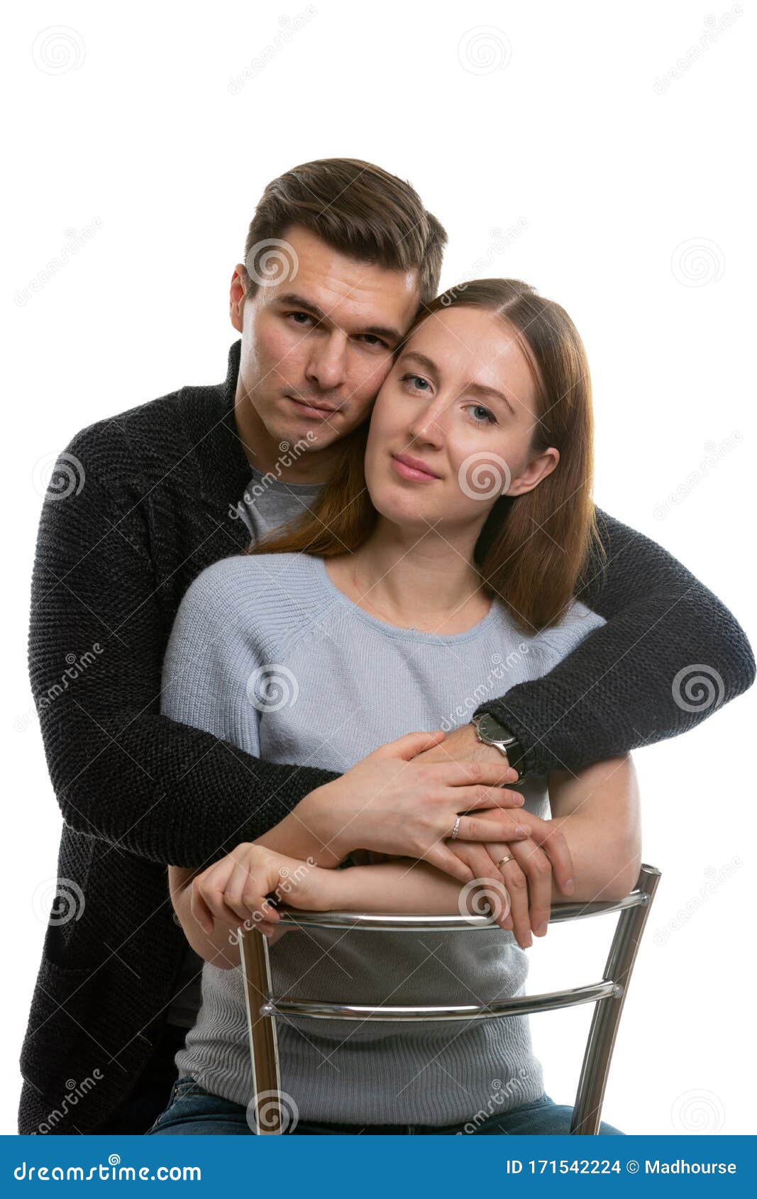 Portrait of a Happy Young Couple on a White Background Stock Photo ...