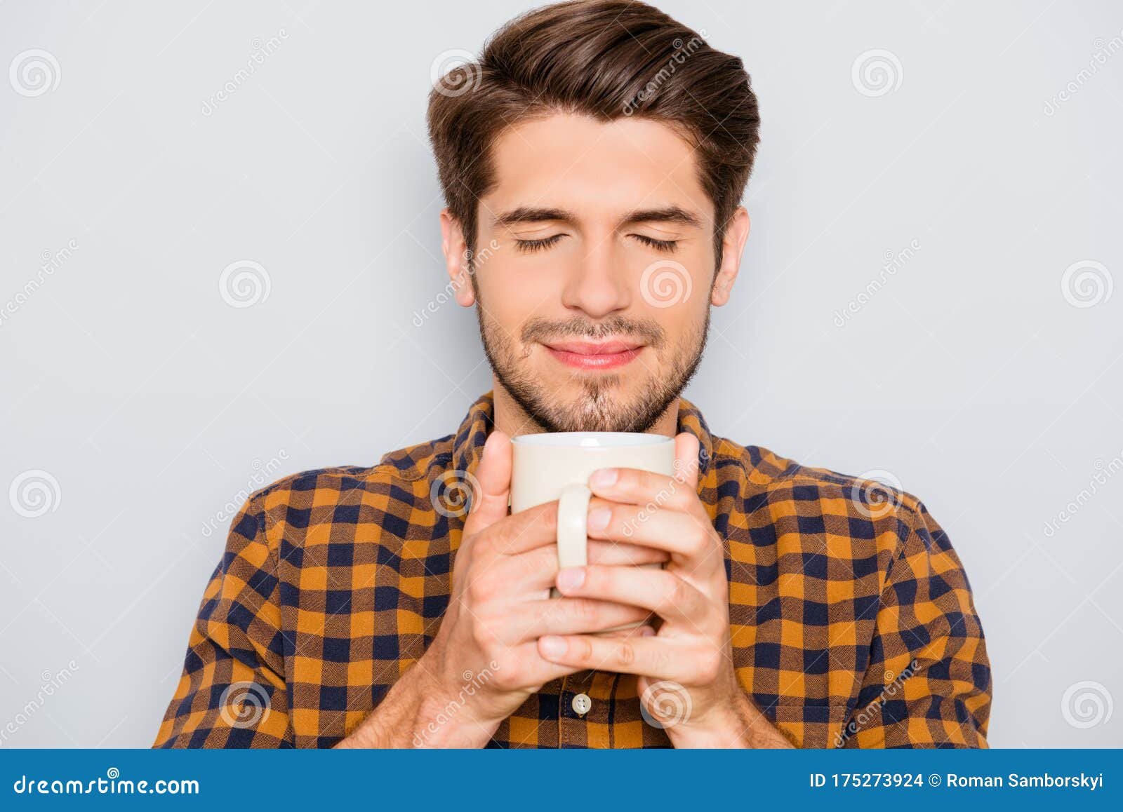 Portrait of Happy Young Man Smelling Aromatic Coffee Stock Photo ...