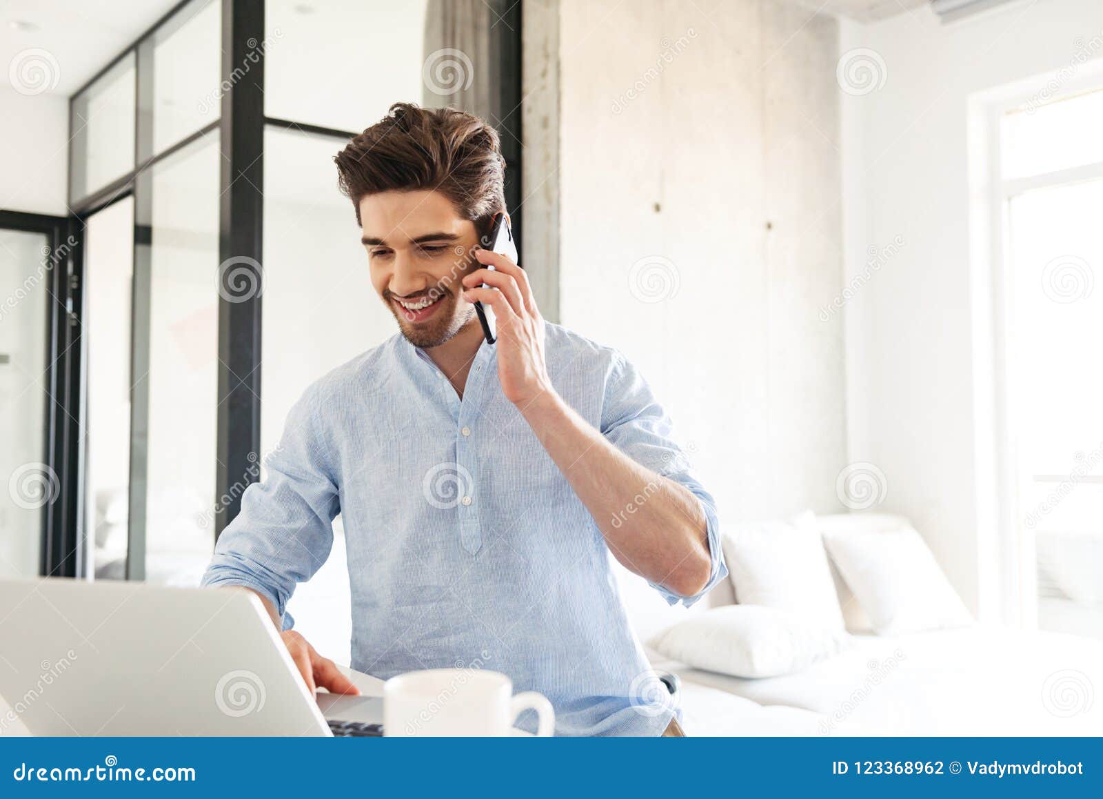 Portrait of a Happy Young Man Using Laptop Computer Stock Photo - Image ...