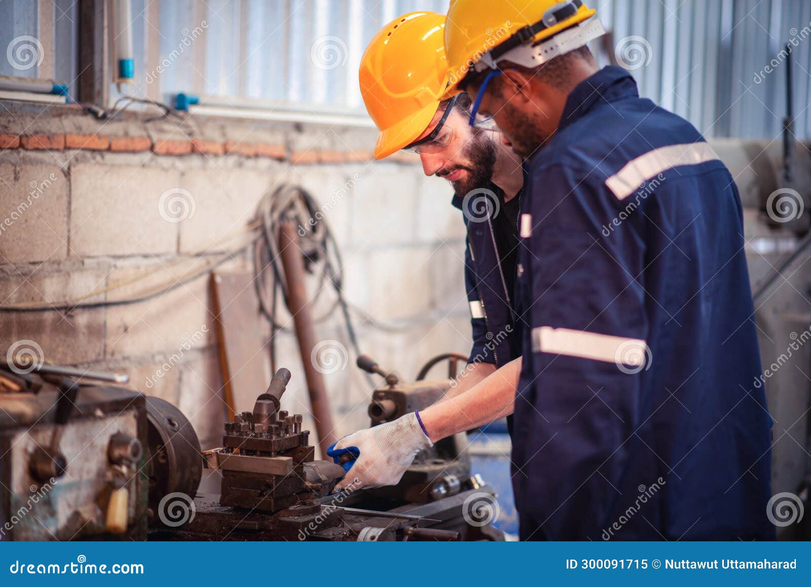 Portrait of Heavy Industry Workers Working on the Metal Fabrication ...