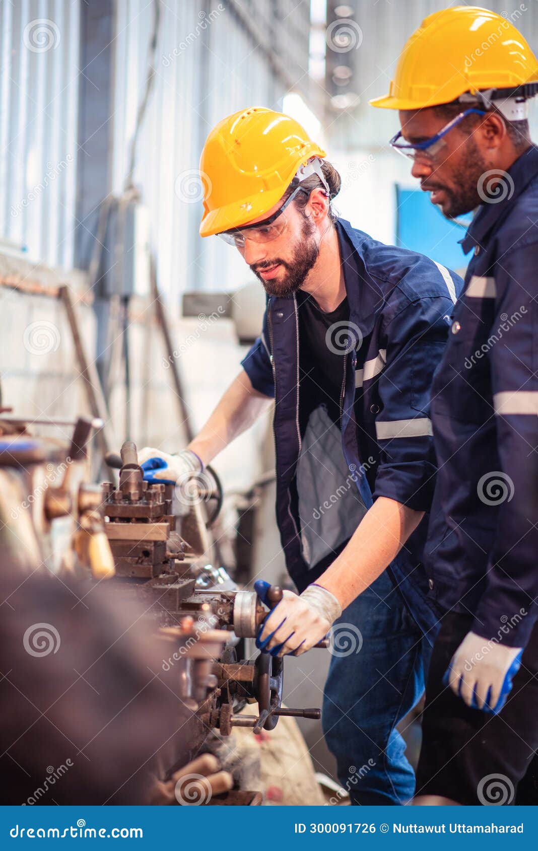 Portrait of Heavy Industry Workers Working on the Metal Fabrication ...