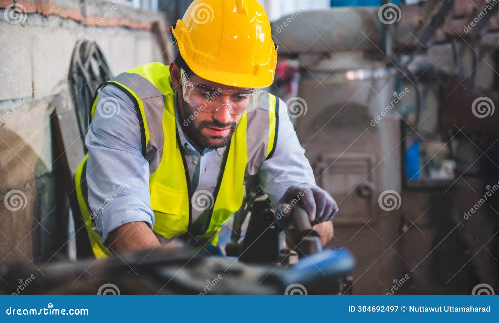 Portrait of Heavy Industry Workers Working on the Metal Fabrication ...