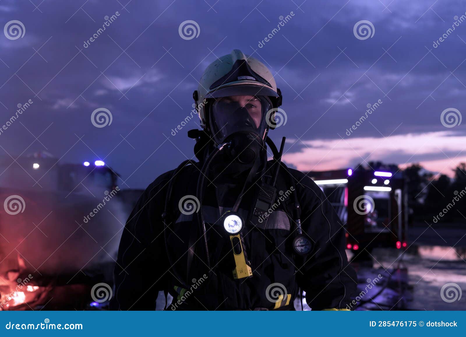 Portrait of a Heroic Fireman in a Protective Suit. Firefighter in Fire ...