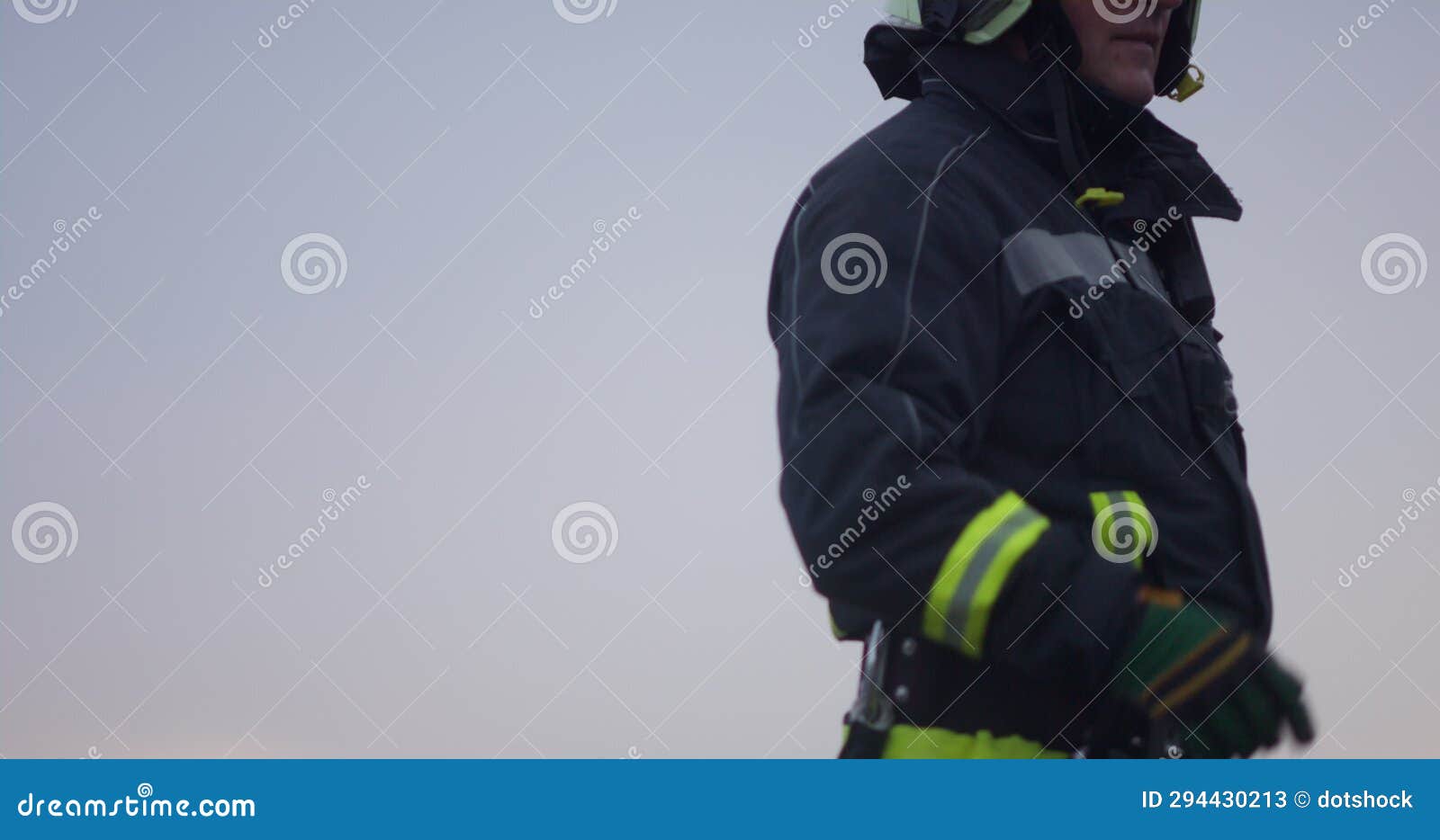 Portrait of a Heroic Fireman in a Protective Suit. Firefighter in Fire ...