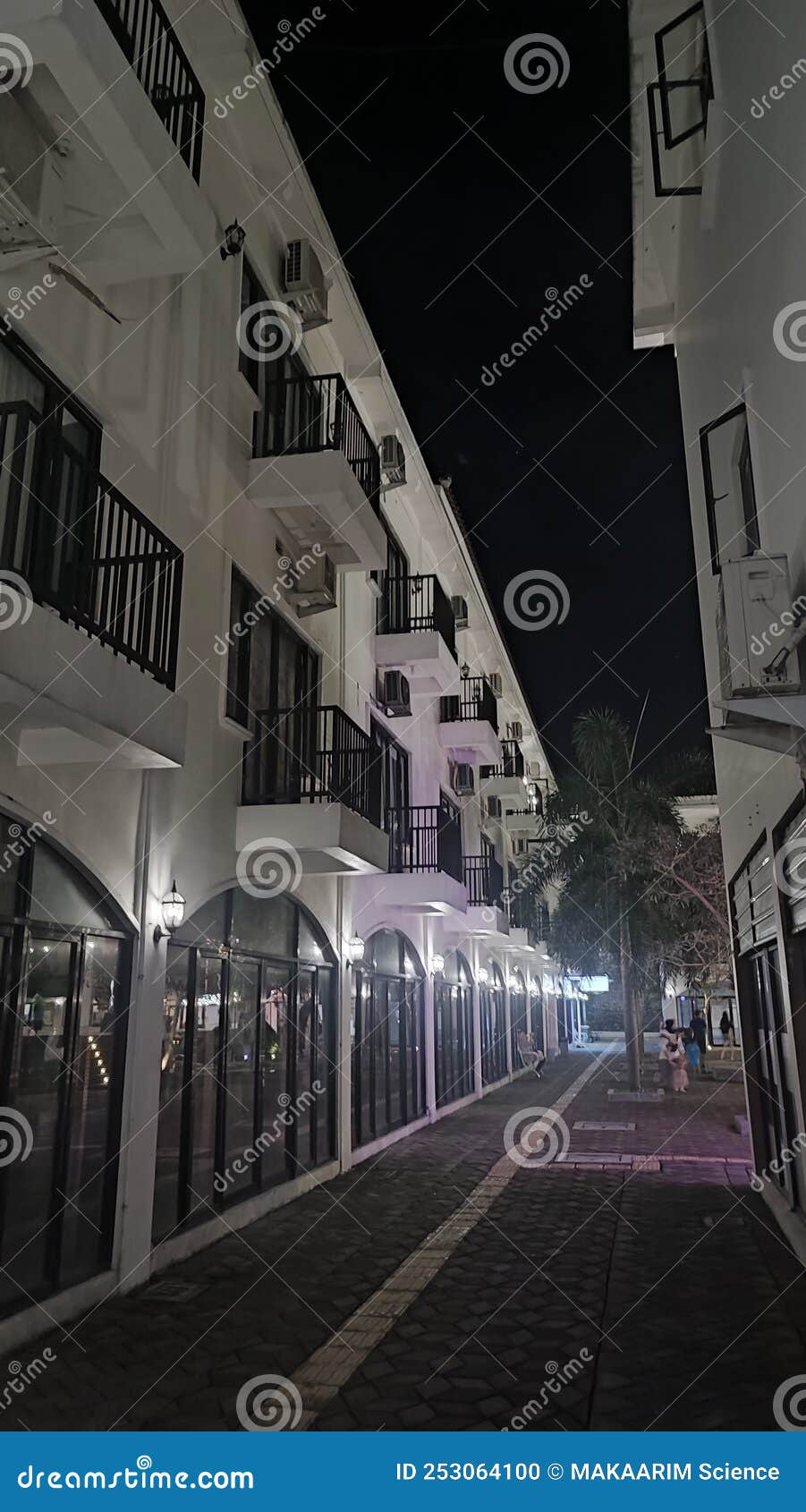 Portrait of High Rise Building at Night Stock Photo - Image of light ...
