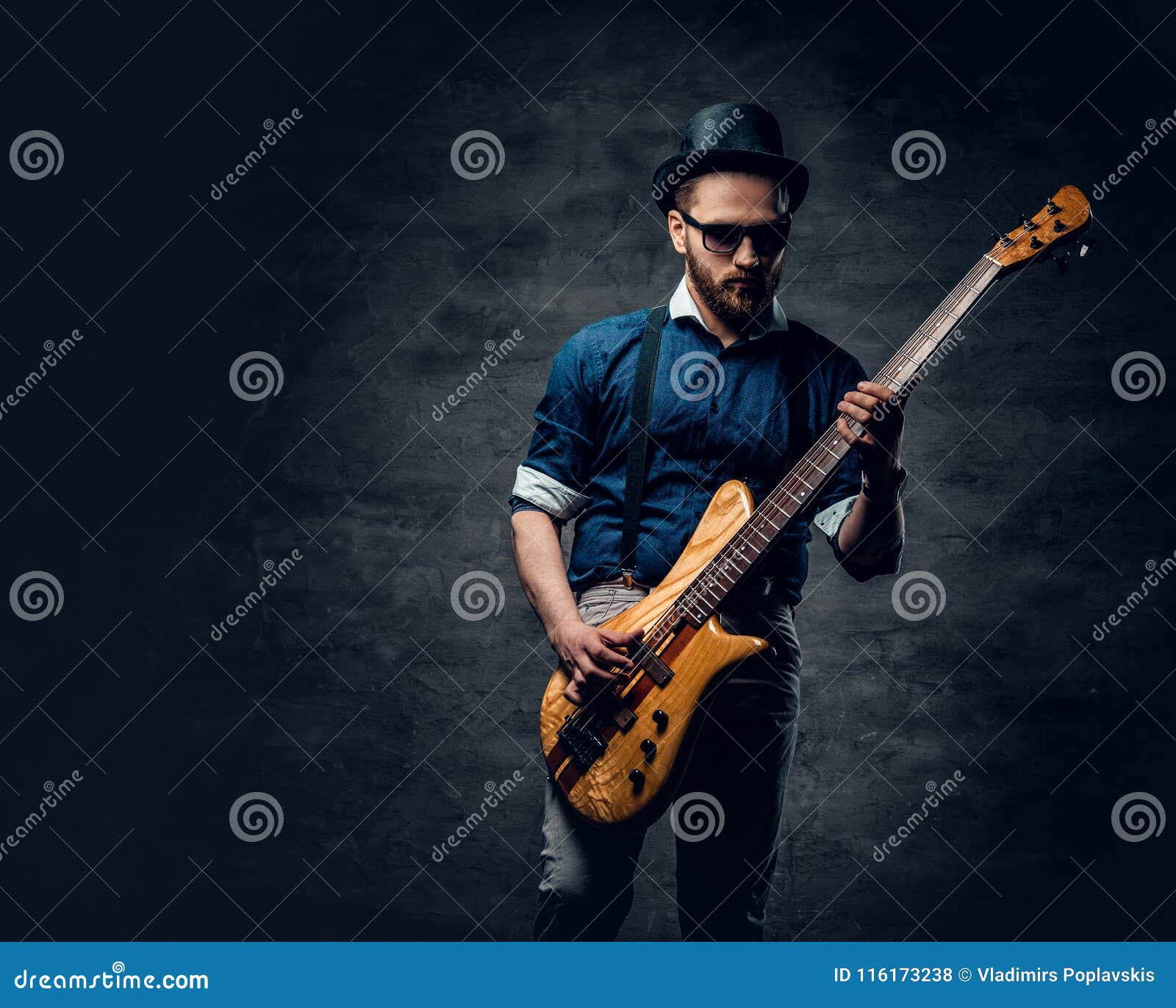 Portrait of the Hipster Bass Player Dressed in Cylinder Hat. Stock ... Portrait of the Hipster Bass Player Dressed in Cylinder Hat. Stock ...