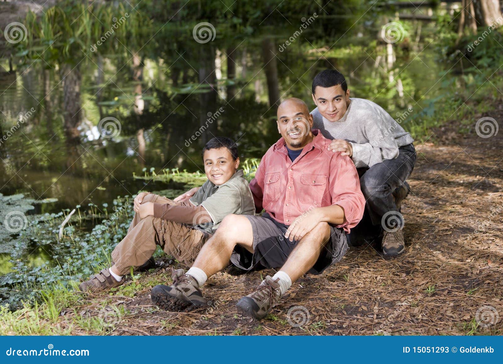 Portrait Hispanic Father and Sons Outdoors by Pond Stock Image - Image ...