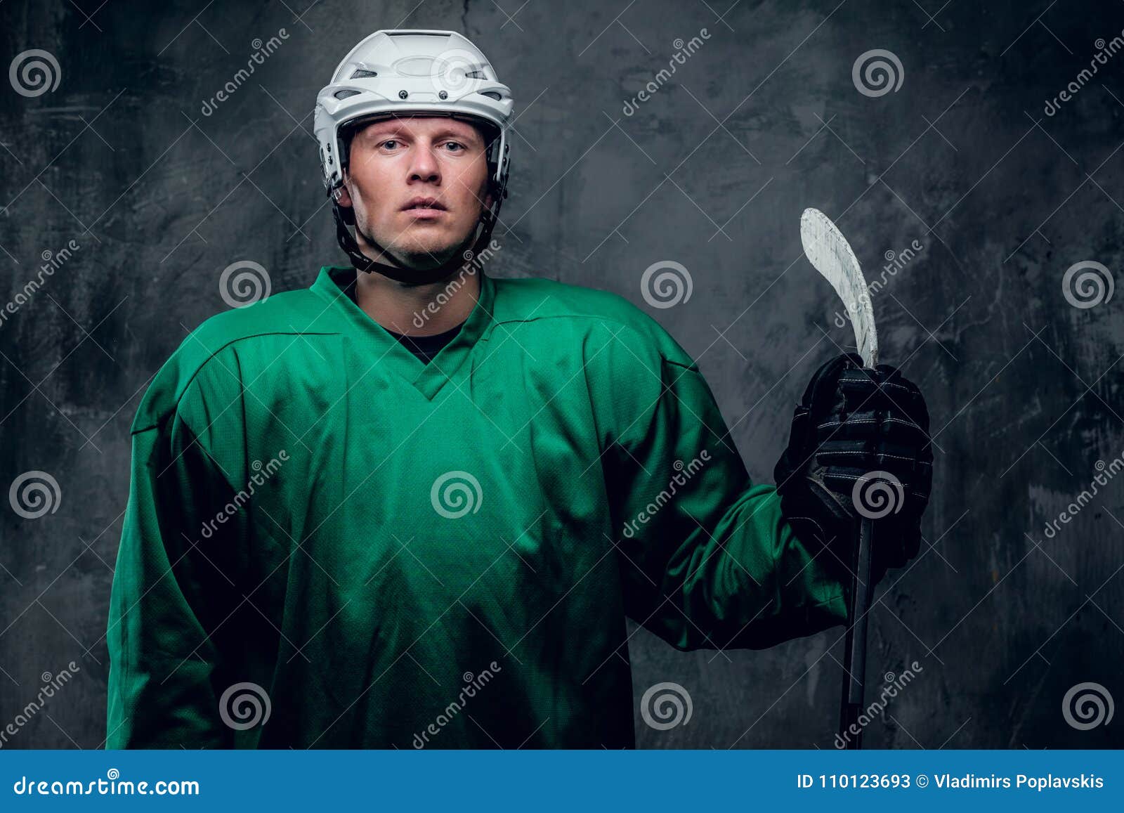 Hockey Player in Protective Clothes Holds Playing Stick. Stock Image ... Hockey Player in Protective Clothes Holds Playing Stick. Stock Image ...