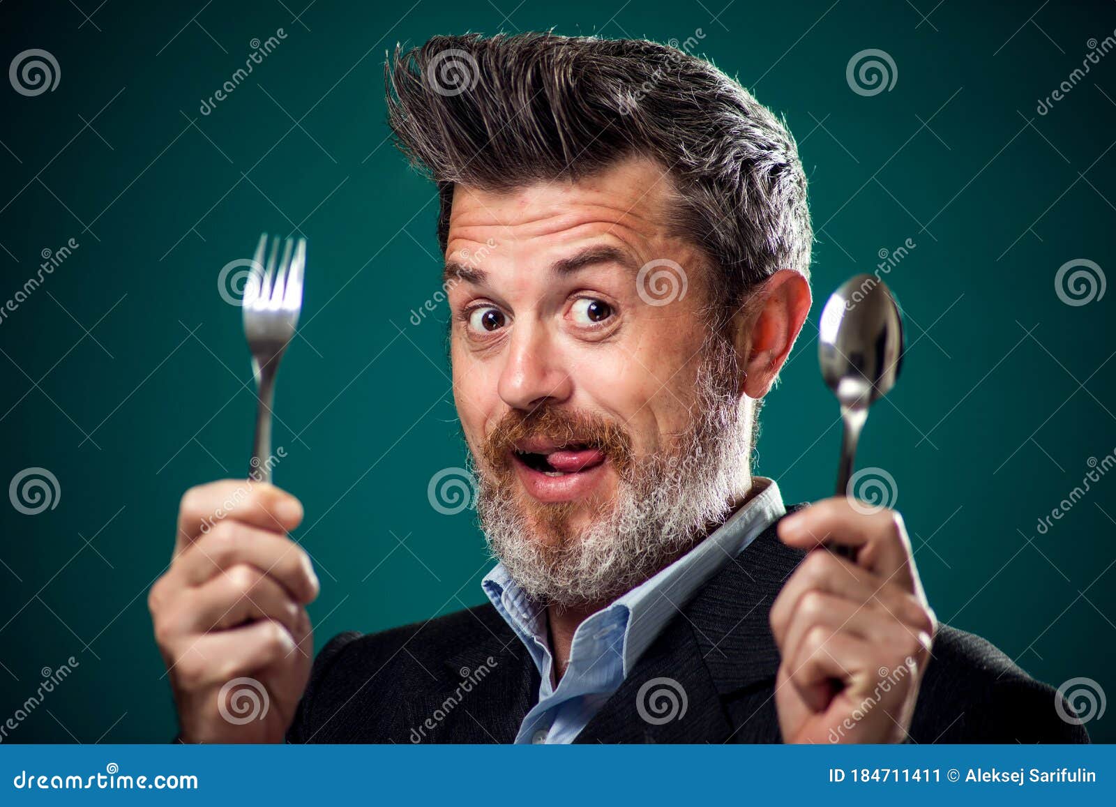 A Portrait of Hungry Man in Suit Holding Spoon and Fork Stock Image ...