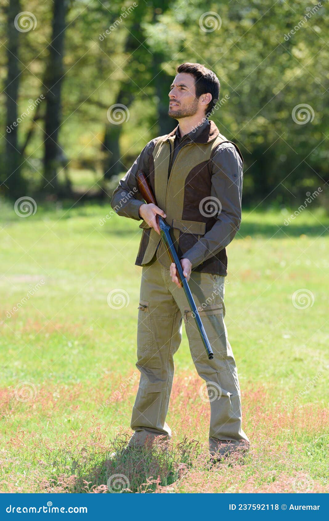 Portrait hunter with rifle stock photo. Image of shotgun - 237592118
