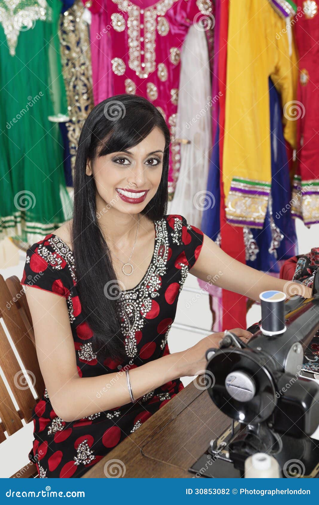 Portrait Indian Female Dressmaker Using Sewing Machine Stock Photos ...