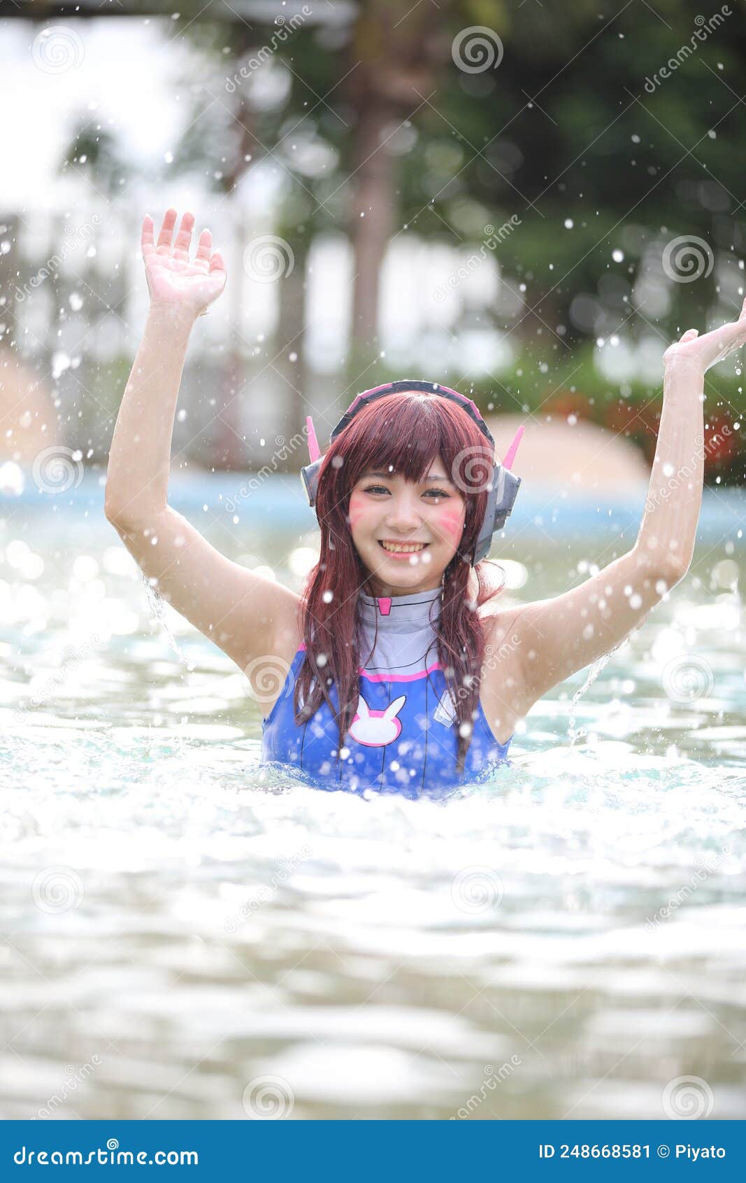 Portrait Of Japan Anime Cosplay Girl With Swim Suit At Swimming Pool