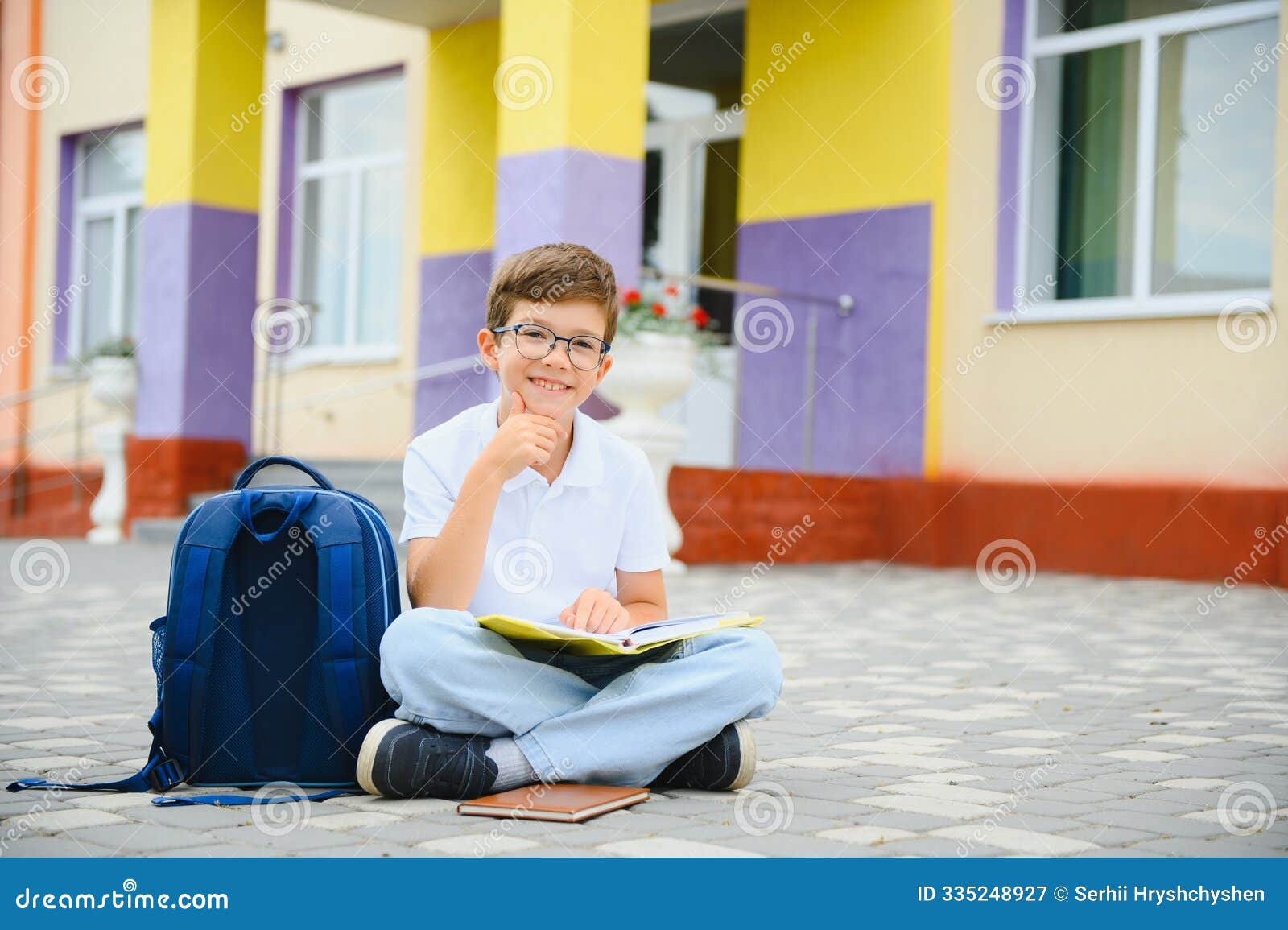 Portrait of a Junior High School Student Sitting and Reading a Book ...