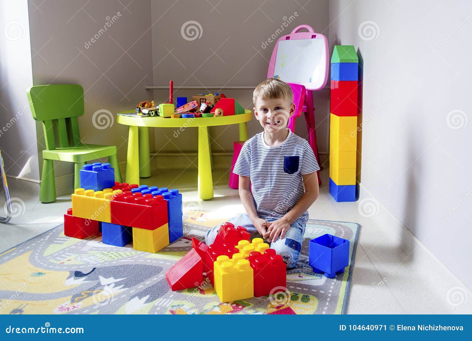 Kid Playing with Construction Blocks Stock Image - Image of happiness ...