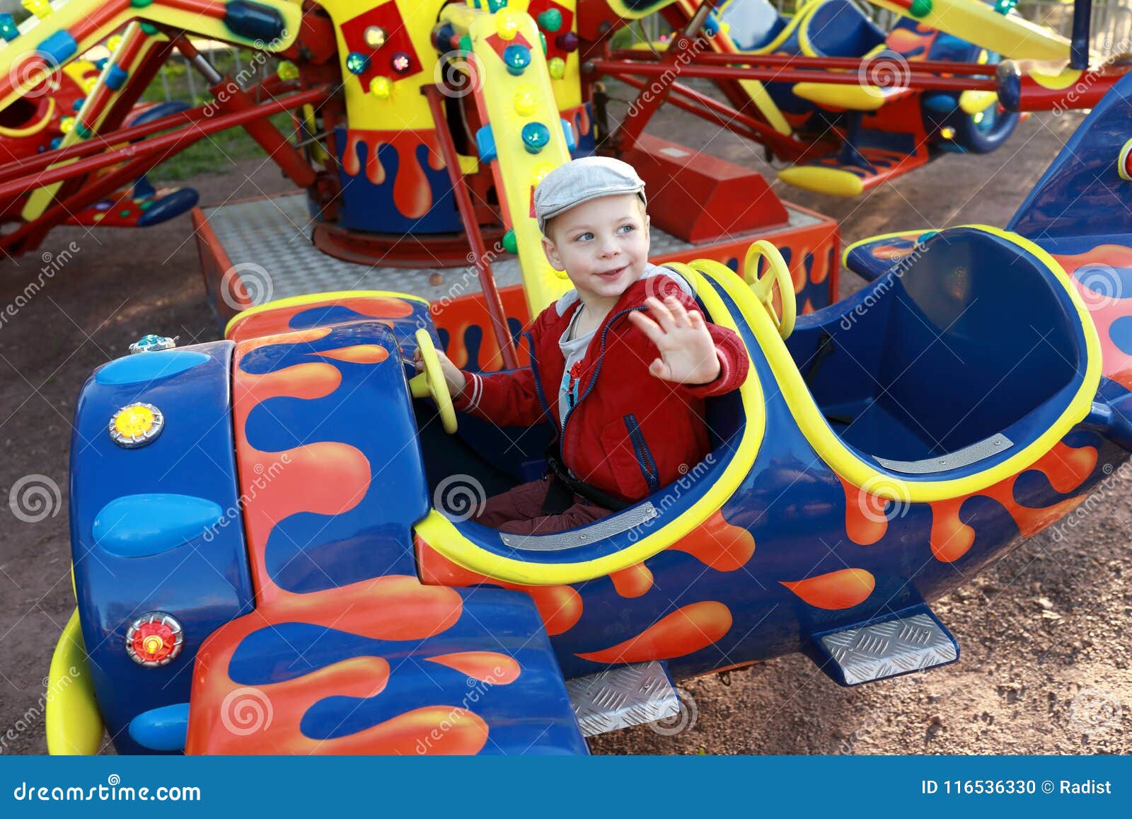 Kid in plane on carousel stock photo. Image of male - 116536330