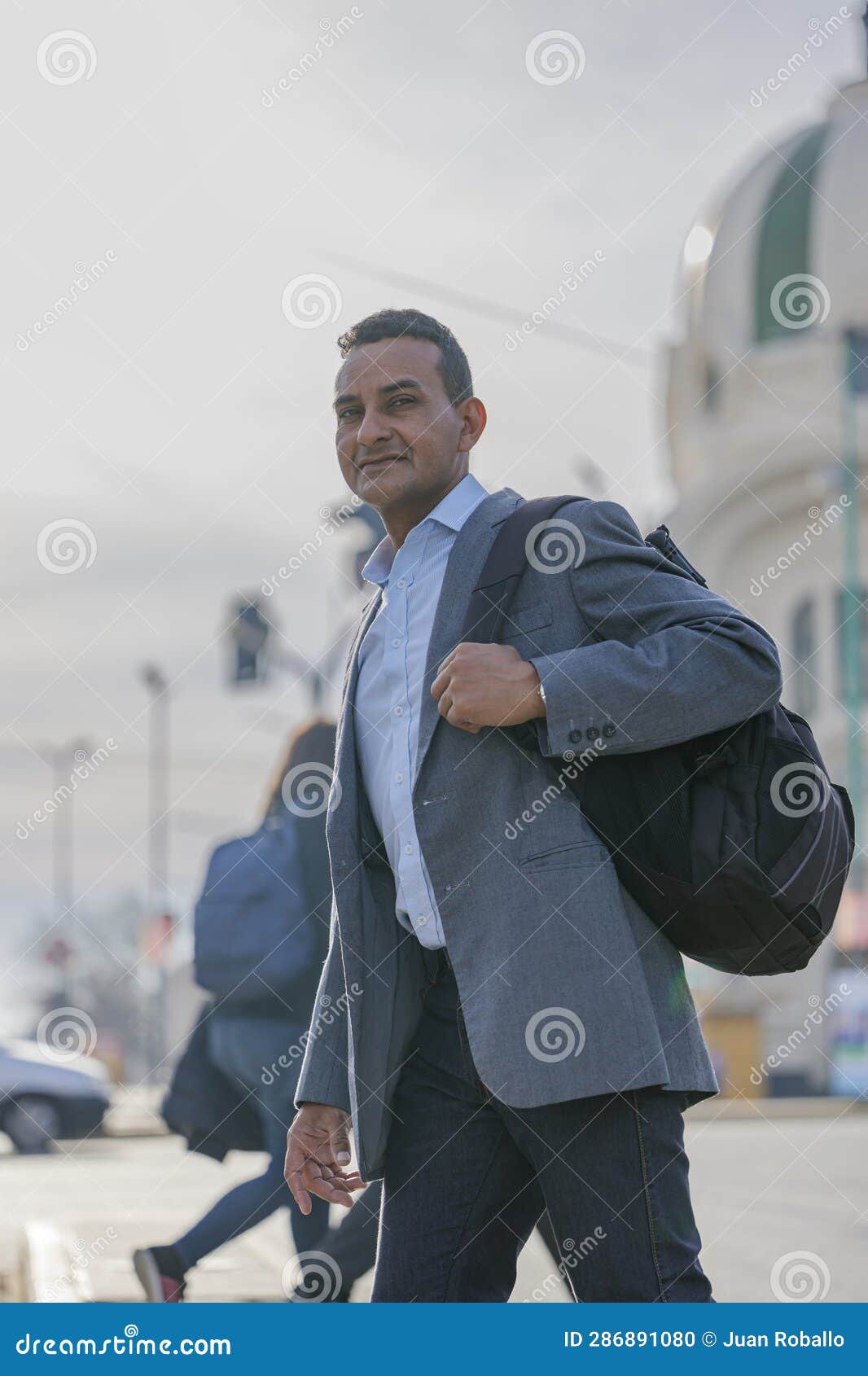 Portrait of Latino Man in Jacket Crossing the Pedestrian Path Stock ...