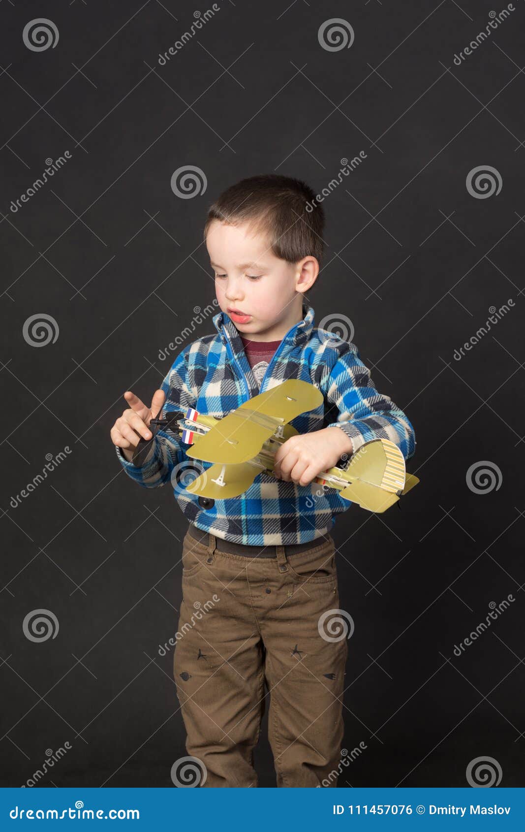 Boy with a model airplane stock photo. Image of human - 111457076