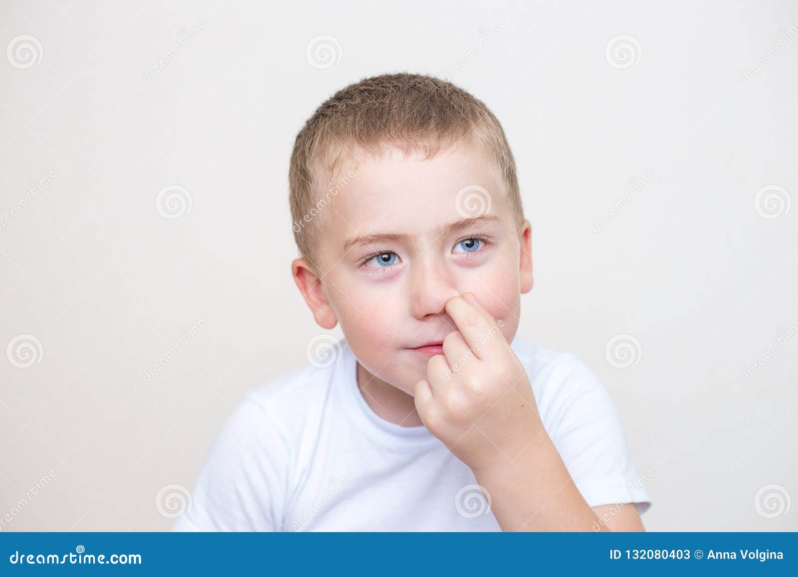 Little Boy is Picking His Nose on a White Background Stock Image ...