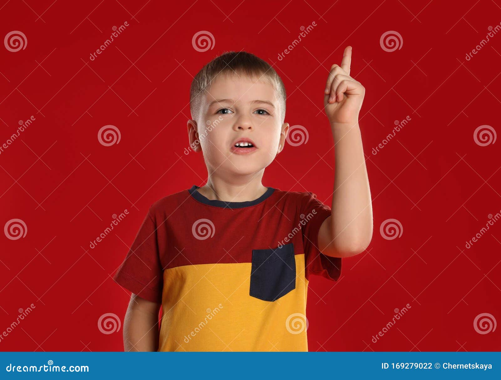 Portrait of Little Boy on Red Stock Photo - Image of adorable, pointing ...