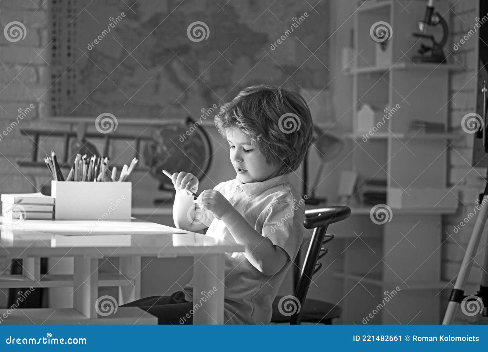 Portrait of Little Boy Sitting in Drawing Class. Stock Image - Image of ...