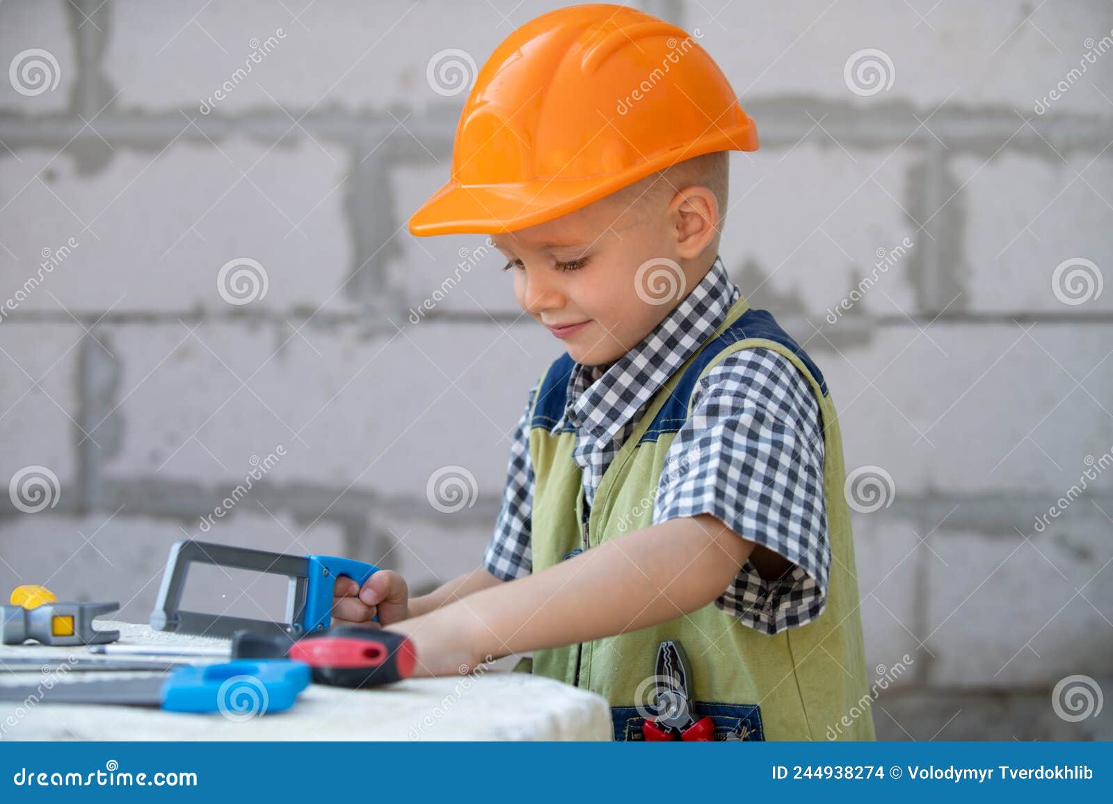 Portrait of Little Builder in Hardhats with Instruments for Renovation ...