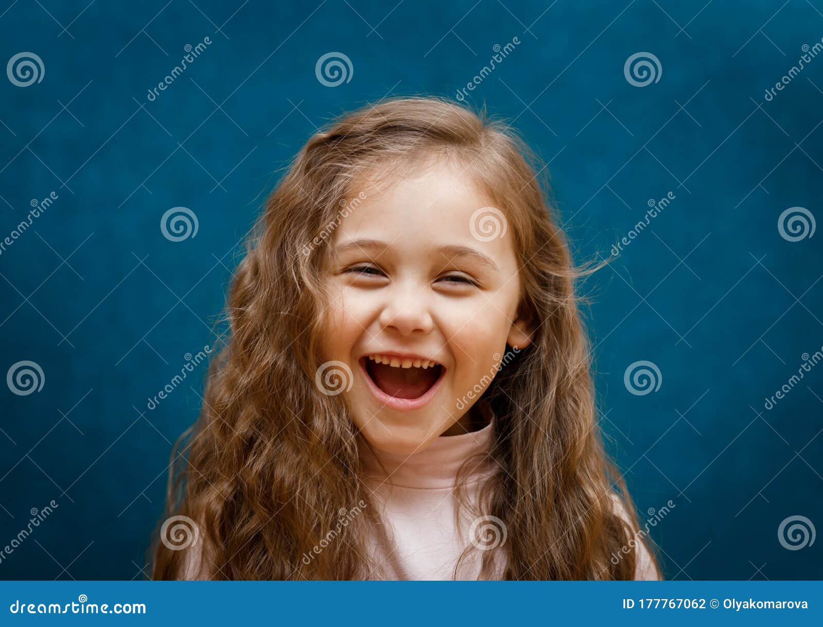 Portrait of a Little Girl with a Cheerful Expression Stock Photo ...