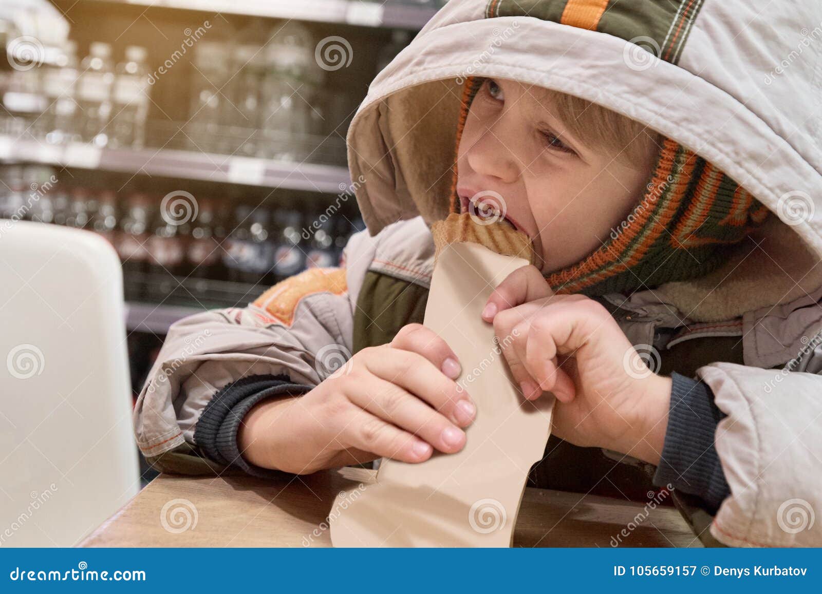 Hungry boy eating stock image. Image of hotdog, fastfood - 105659157