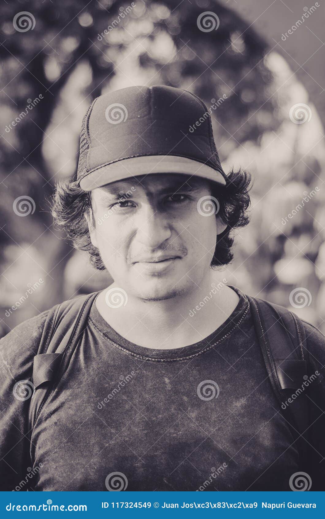 A Portrait of the Long-haired Young Man with Backpack Stock Image ...