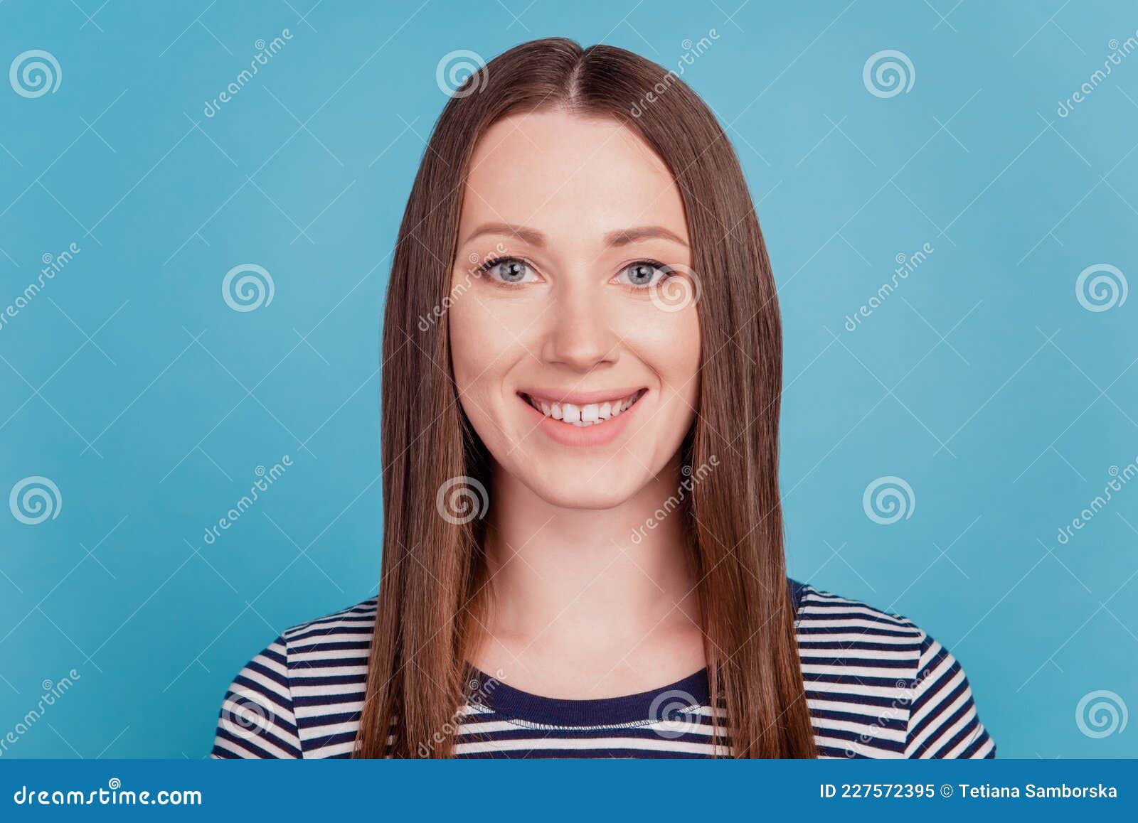 Portrait Of Lovely Adorable Positive Lady Toothy Beaming Smile On Blue