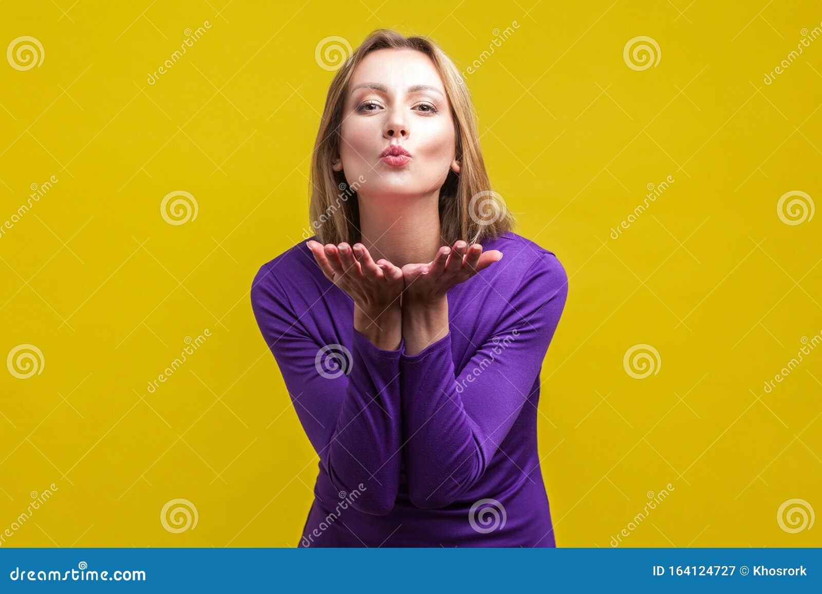 Portrait Of Lovely Beautiful Young Woman Sending Air Kiss Isolated On