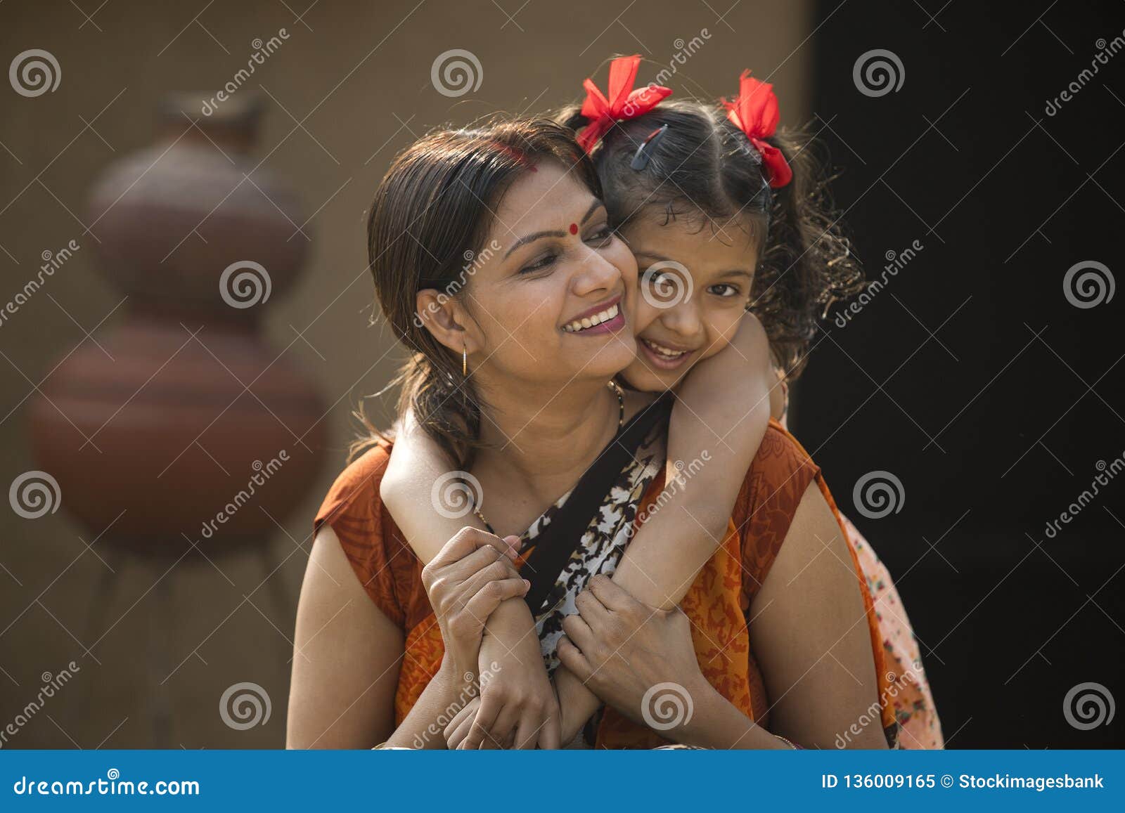 Portrait Of Loving Indian Mother And Daughter At Village Stock Image