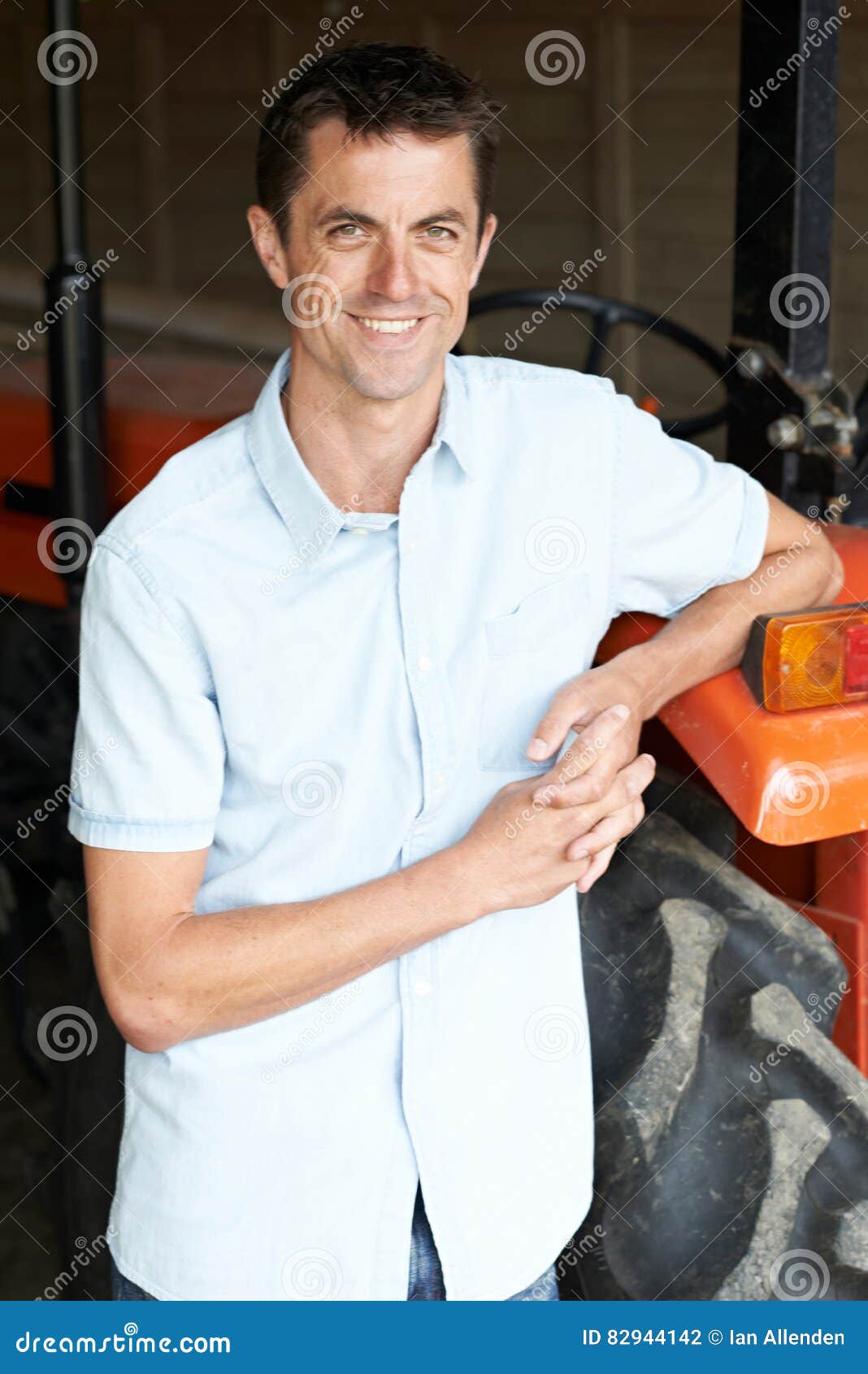 Portrait of Male Agricultural Worker with Tractor Stock Photo - Image ...