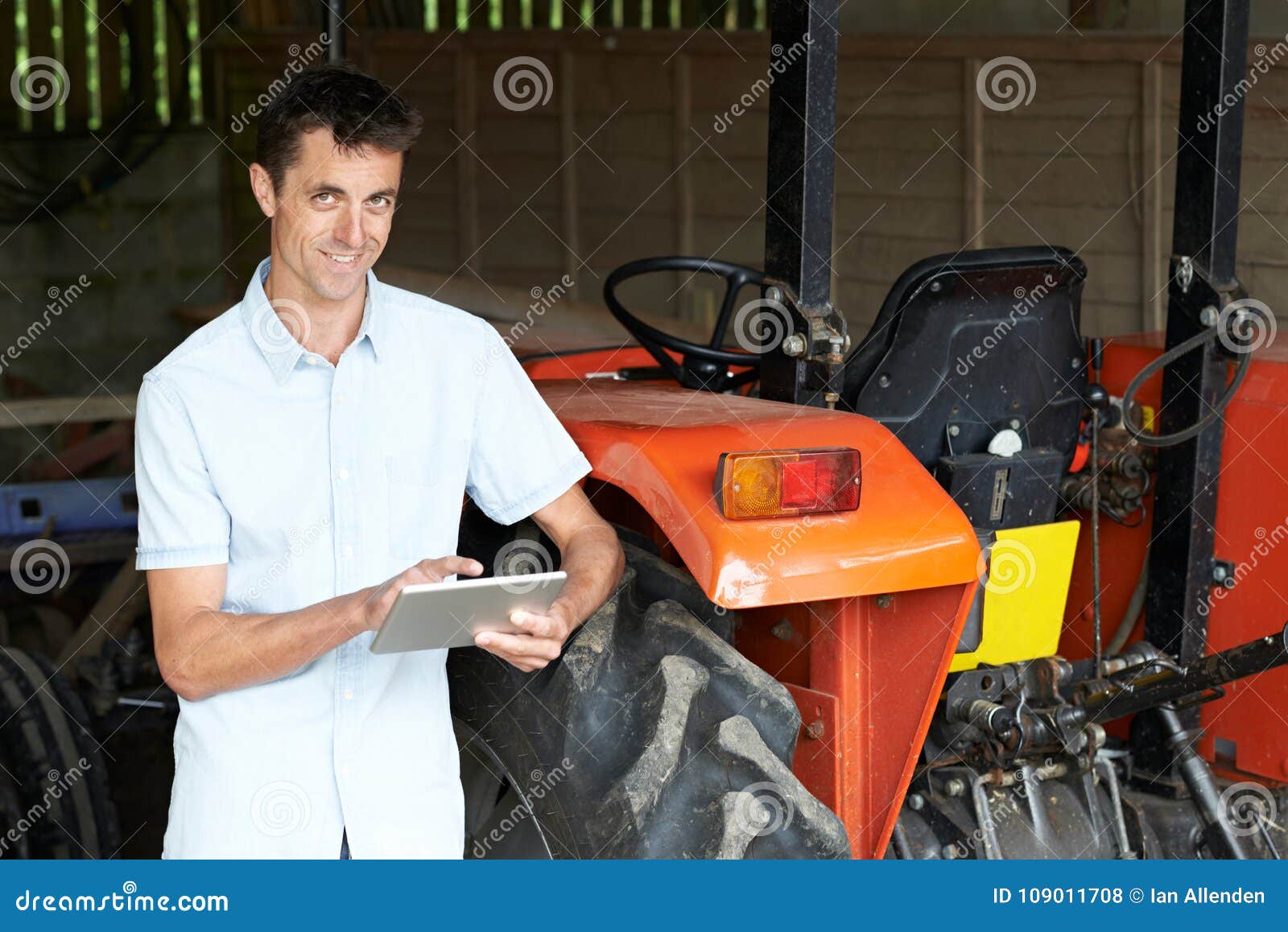 Portrait of Male Agricultural Worker Using Digital Tablet Stock Photo ...