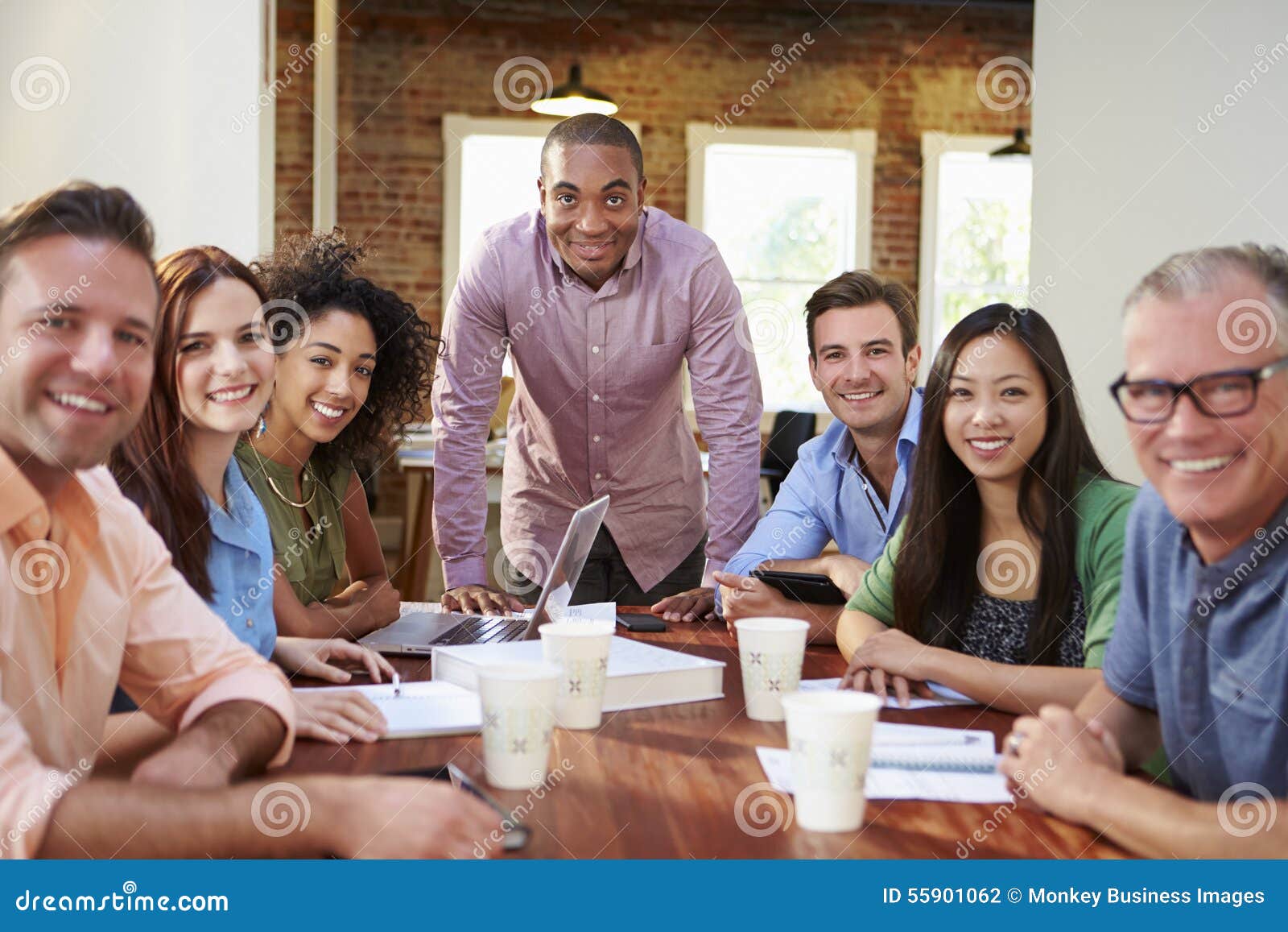 Portrait of Male Boss with Team in Meeting Stock Photo - Image of black ...