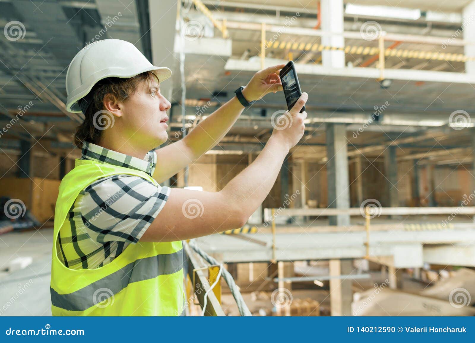 Portrait of Male Builder, Manager, Engineer Photographing Construction ...