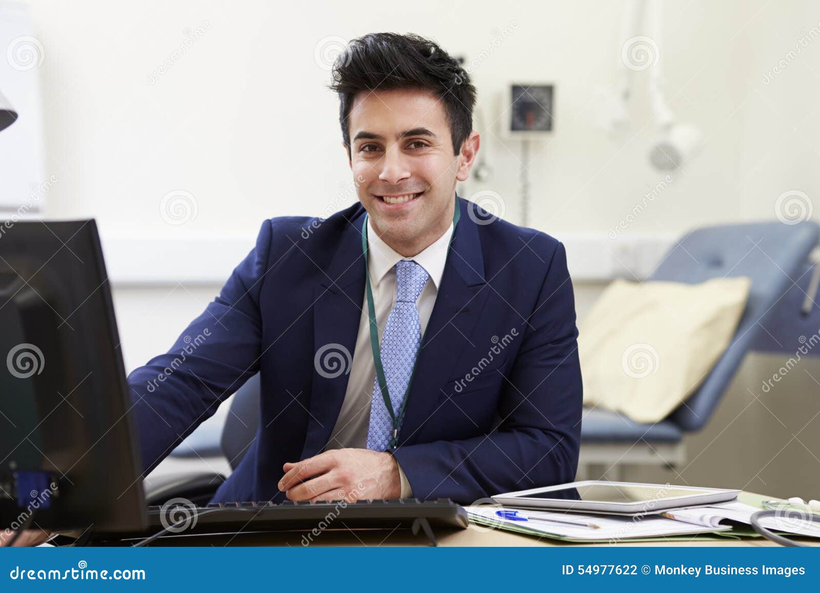 Portrait of Male Consultant Working at Desk Stock Photo - Image of name ...