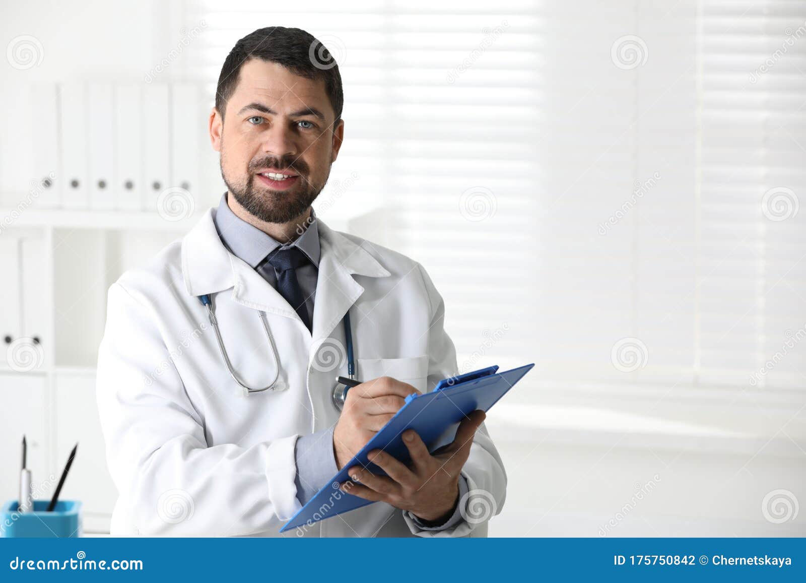 Portrait of Male Doctor in Coat at Workplace Stock Photo - Image of ...
