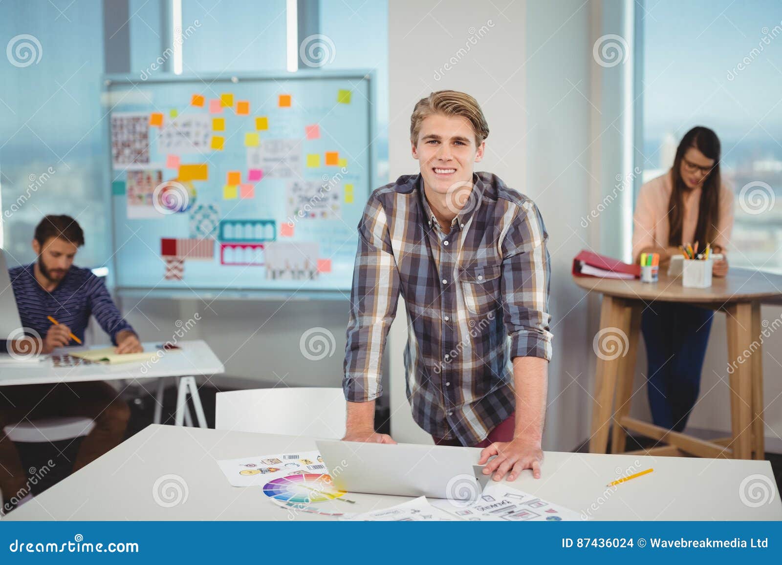 Portrait of Male Graphic Designer Leaning on Table Stock Photo - Image ...
