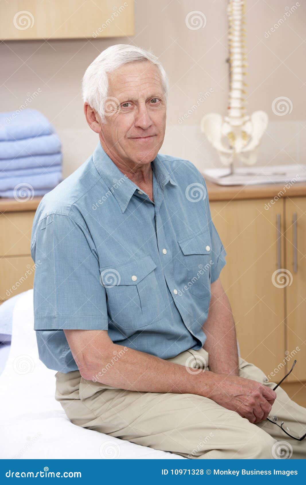 Portrait of male osteopath stock photo. Image of career - 10971328