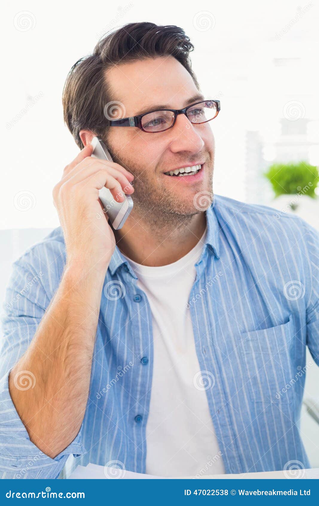 Portrait of a Male Photo Editor Using Phone Stock Photo - Image of ...