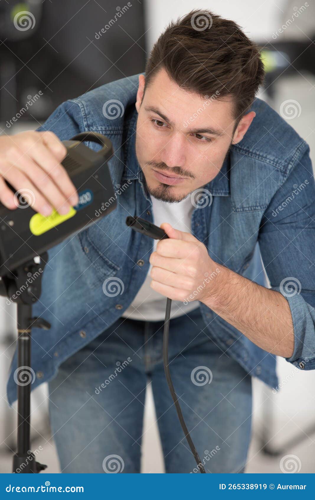 Portrait Male Photographer in Studio Plugging Flash Strobe Stock Image ...