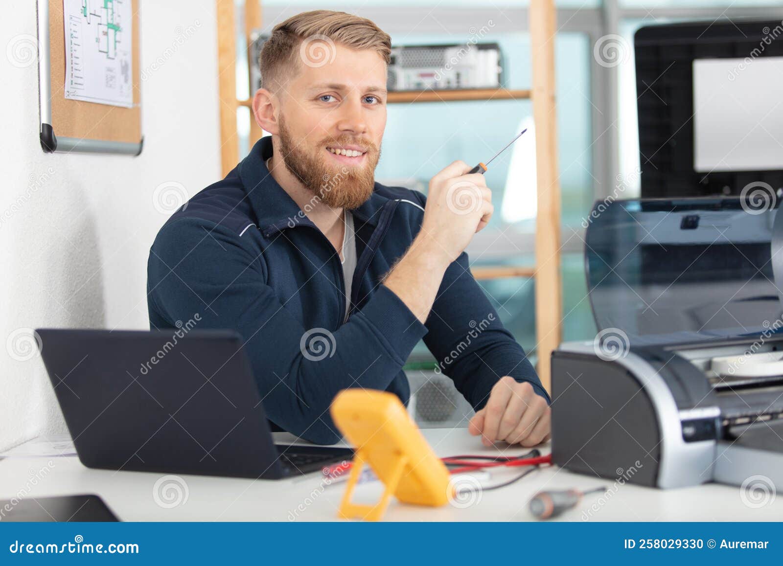 Portrait Male Technician at Workbench with Multimeter Stock Photo ...