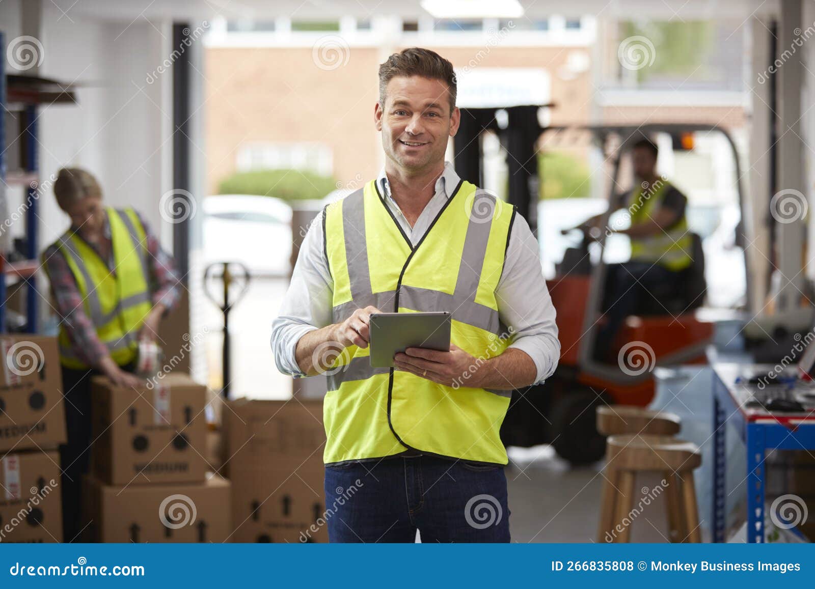 Portrait of Male Worker in Logistics Distribution Warehouse Using ...