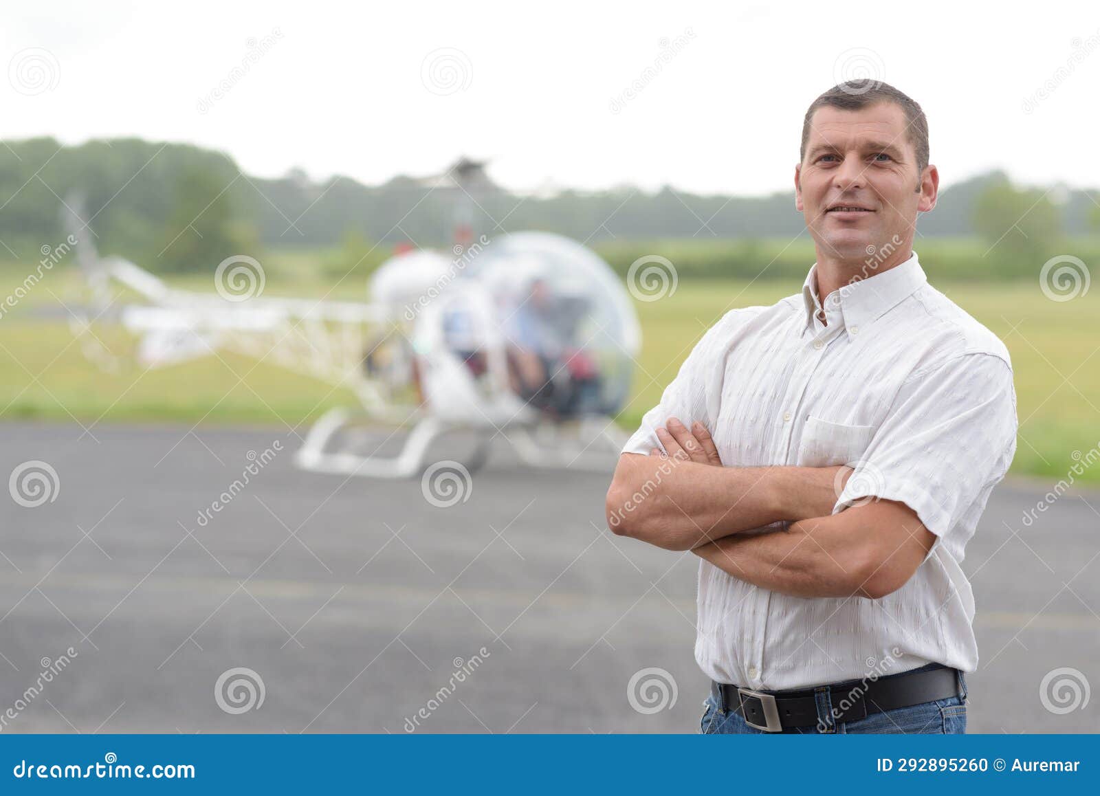 Portrait Man at Airfield Helicopter in Background Stock Photo - Image ...