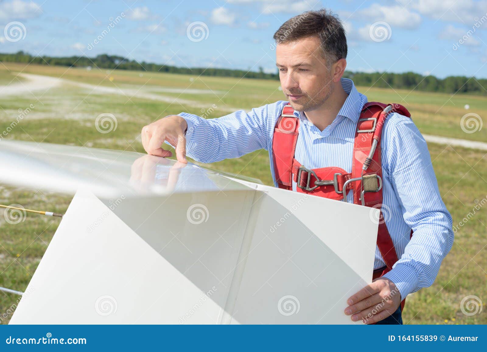 Portrait Man Assembling Glider Stock Image - Image of ultralight, white ...