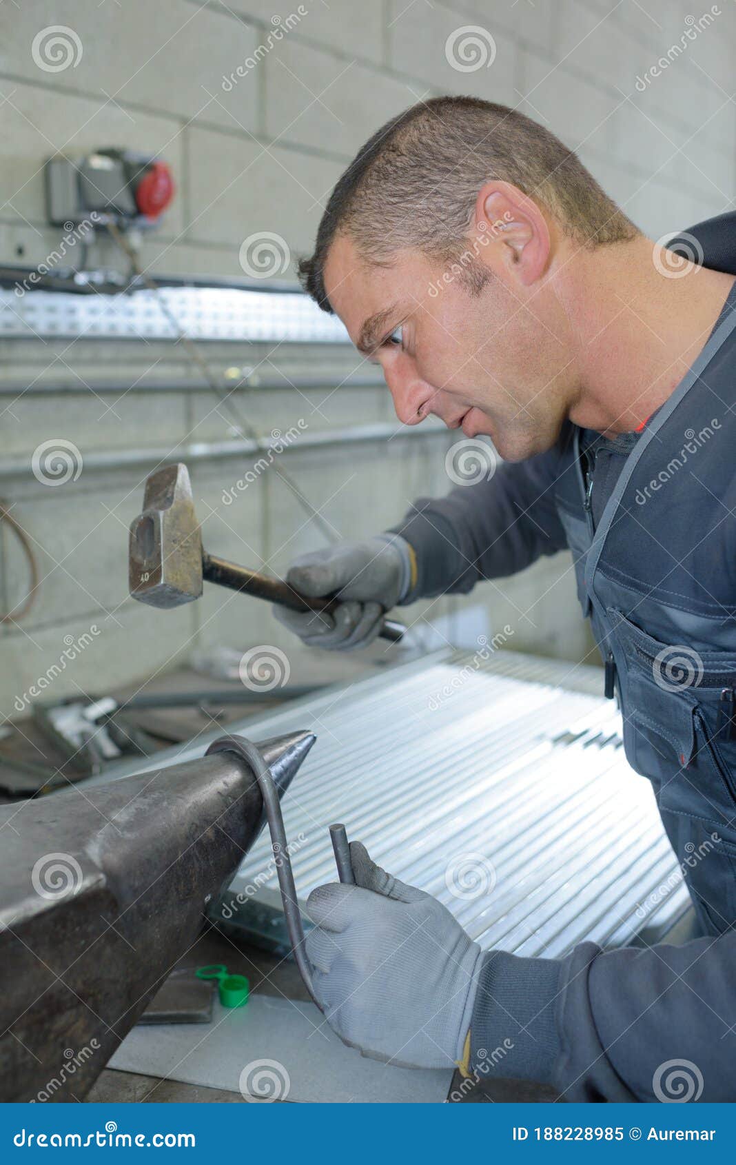 Portrait man bending metal stock image. Image of industry - 188228985