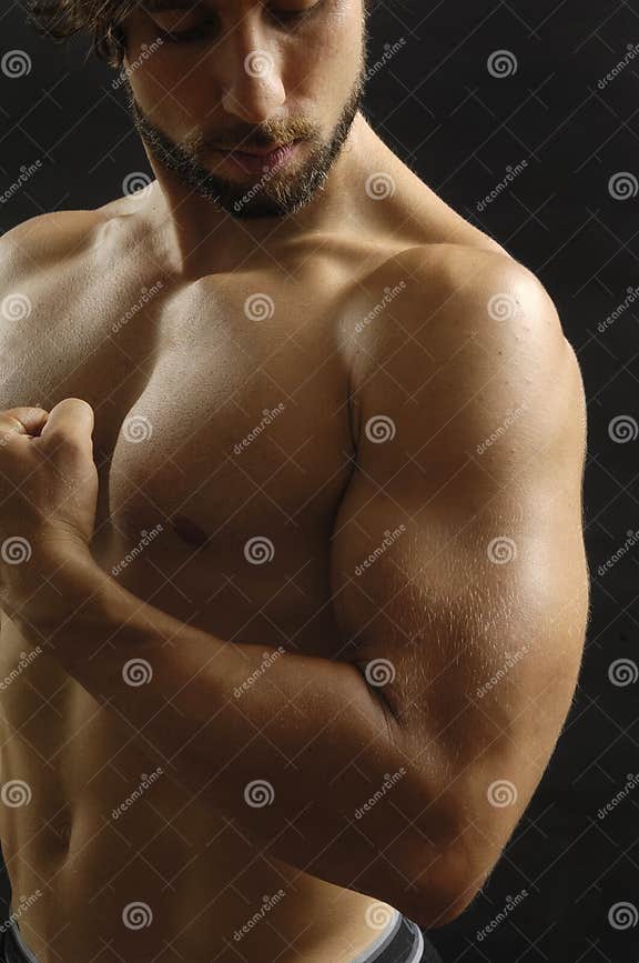 Portrait of a Man with Biceps, Black Background Stock Photo - Image of ...