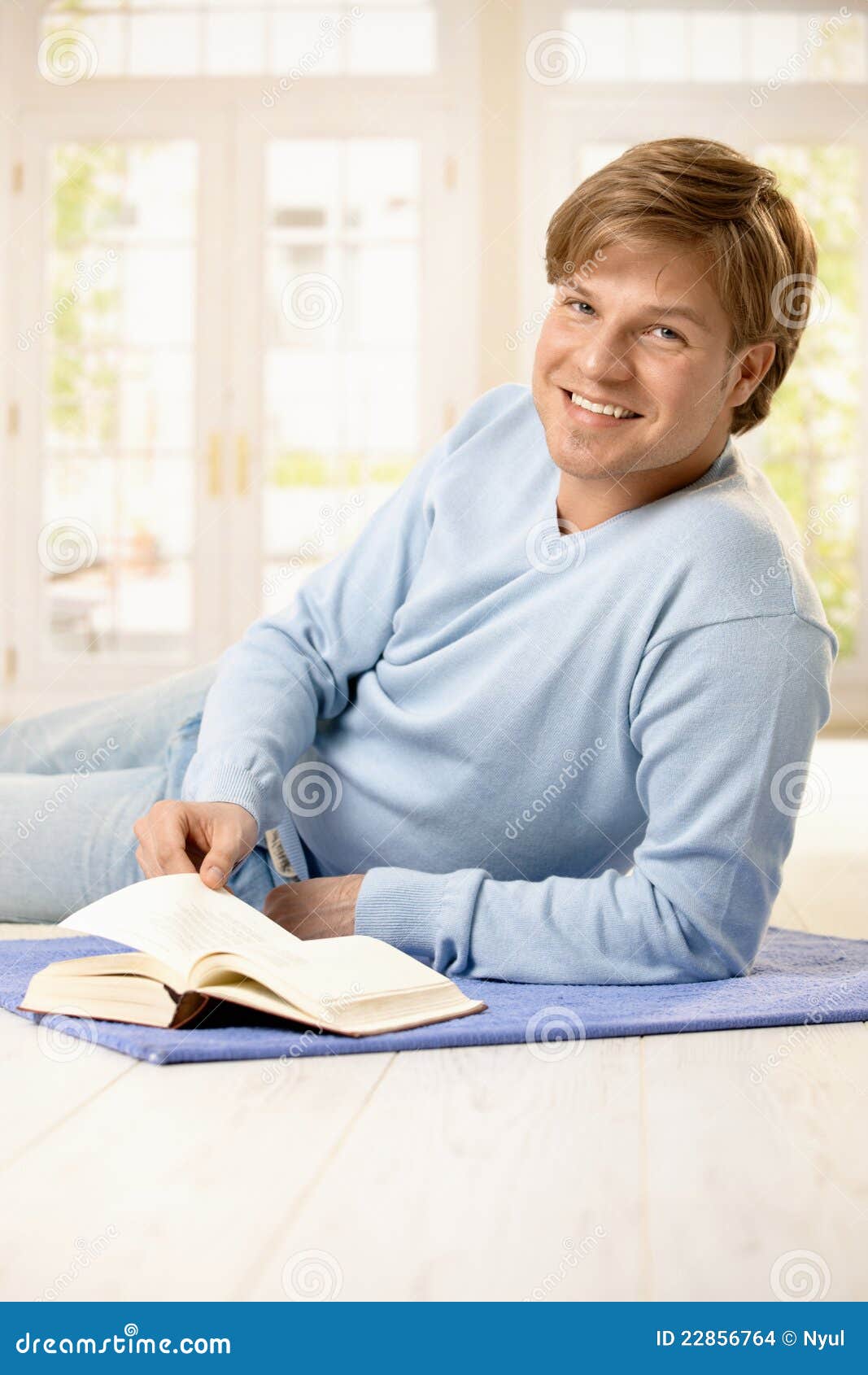Portrait of man with book stock photo. Image of leisure - 22856764